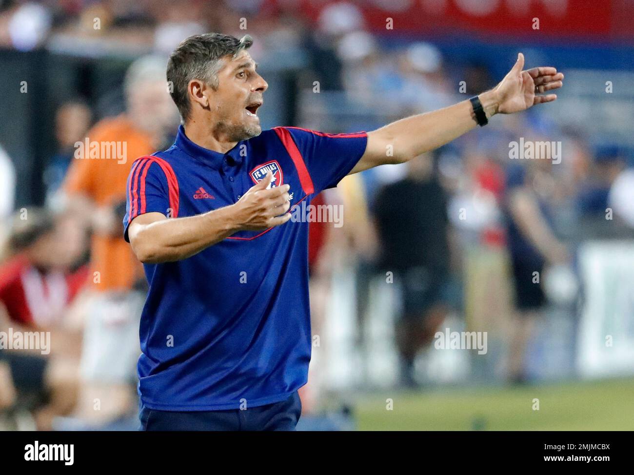 FC Dallas head coach Luchi Gonzalez instructs his team during a ...