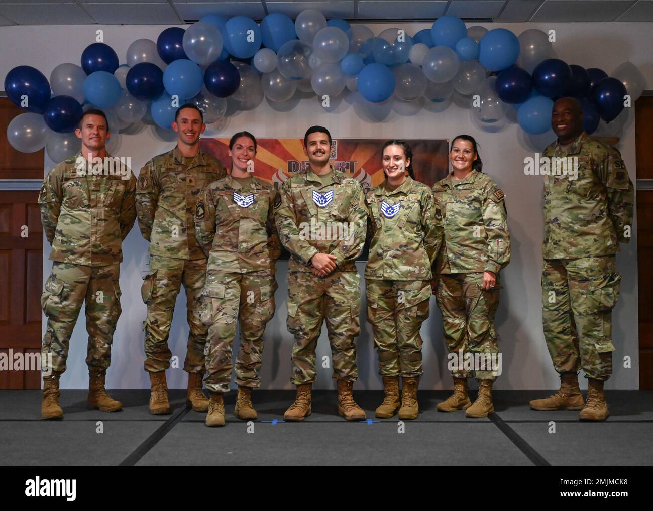 355th Wing Staff Agency Staff Sgt. selects pose for a group photo with ...