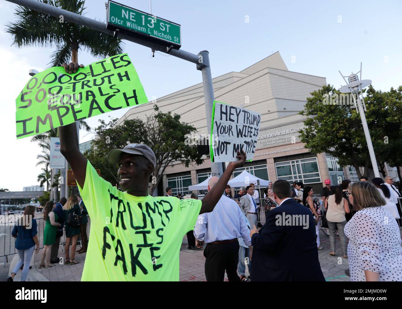 Xavier Presley protests against President Donald Trump outside of the ...