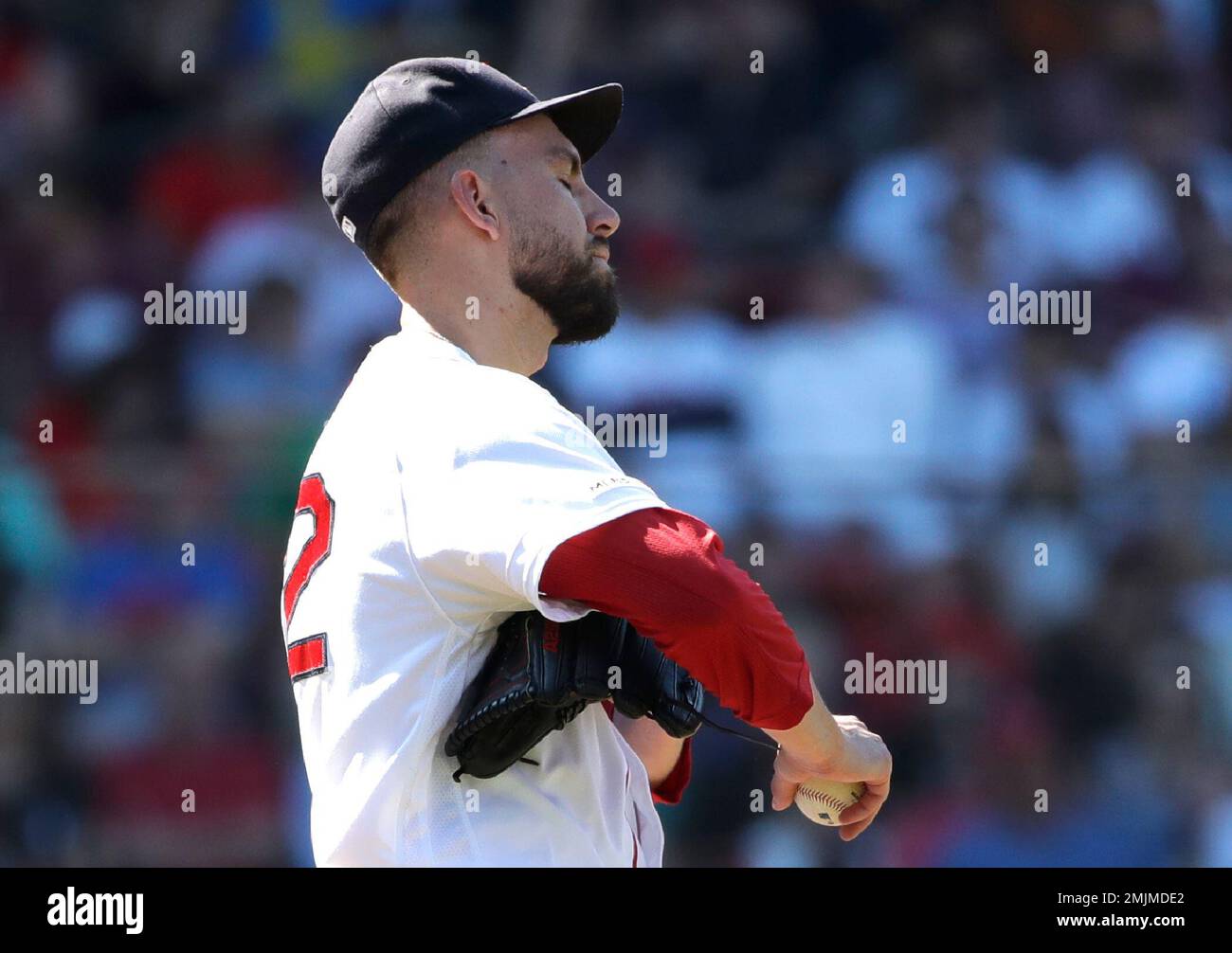 Boston Red Sox relief pitcher Matt Barnes reacts after giving up a two ...
