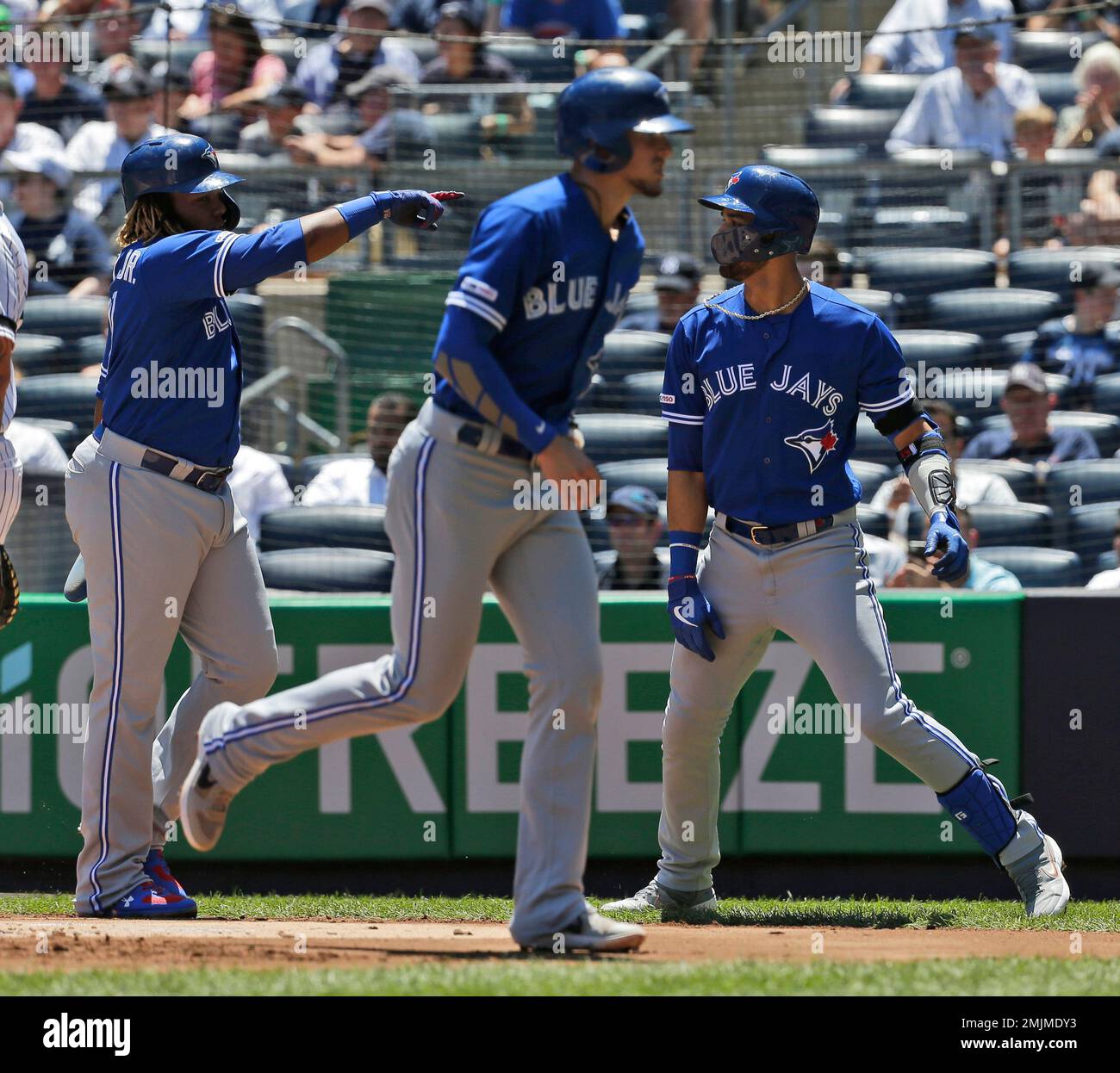 Toronto Blue Jays' Lourdes Gurriel Jr., right, celebrates his three-run ...