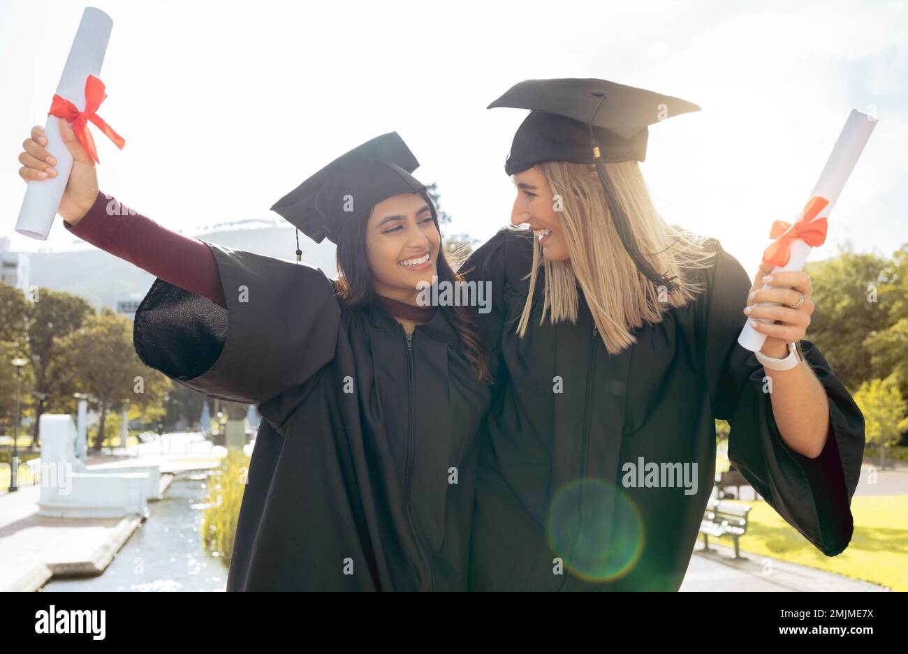 Graduation, celebration and friends with diploma, success and pride ...