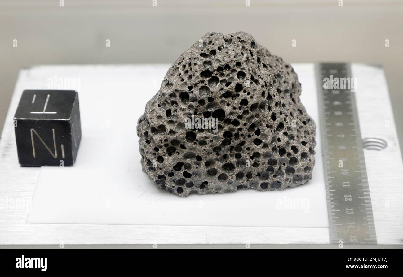 Collected during Apollo 15, a 3.5 billion years old basalt rock similar ...