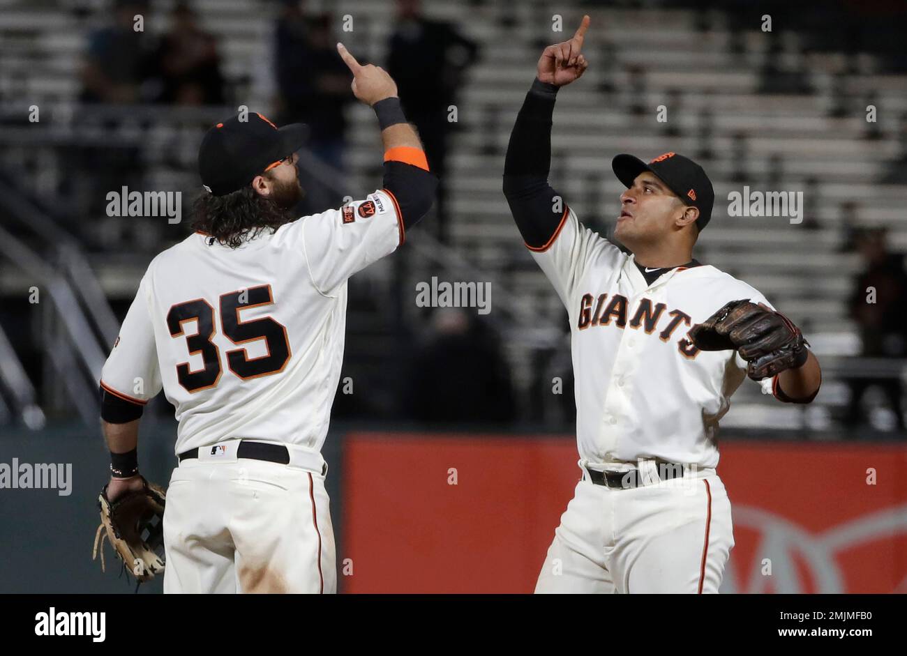 San Francisco Giants' Brandon Crawford (35) celebrates with Donovan ...