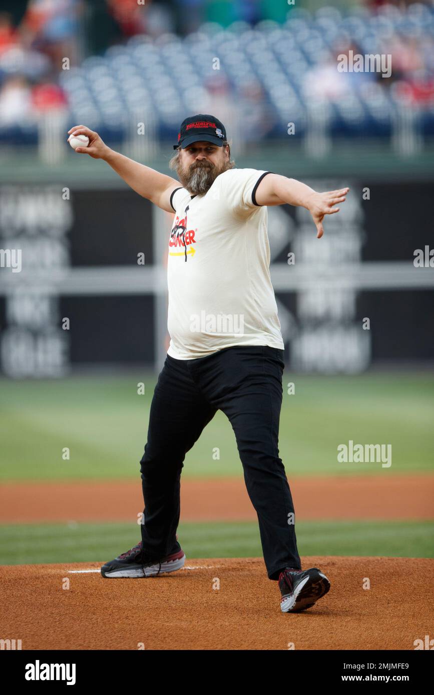 Actor David Harbour throws out a ceremonial first pitch before a ...