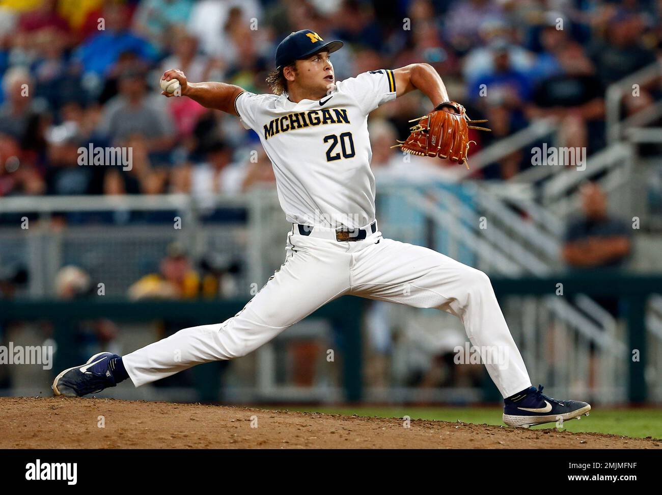 Michigan pitcher Willie Weiss (20) throws against Vanderbilt in the ...