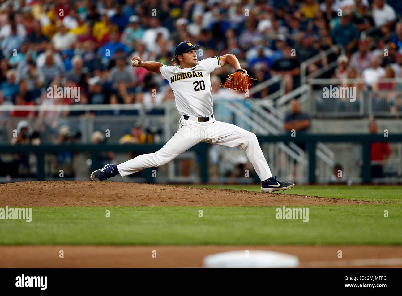 Michigan pitcher Willie Weiss (20) throws against Vanderbilt in the ...
