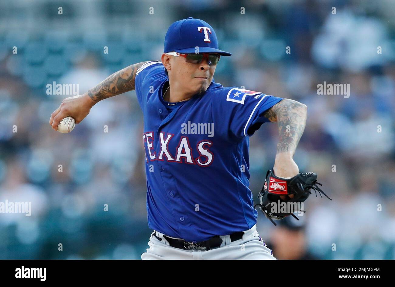Texas Rangers starting pitcher Jesse Chavez winds up during the first ...