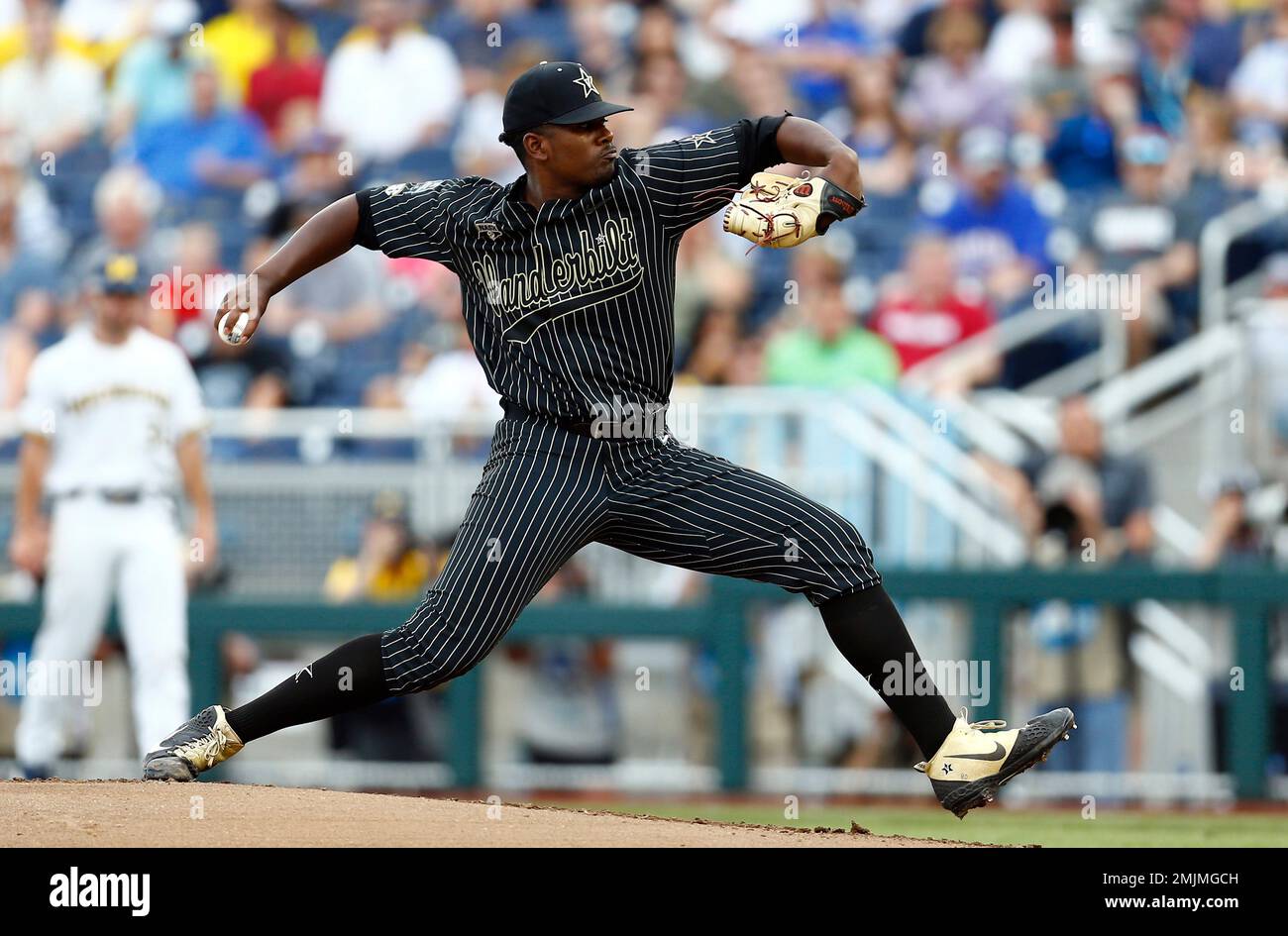 Vanderbilt pitcher Kumar Rockeer (80) throws against Michigan in the ...