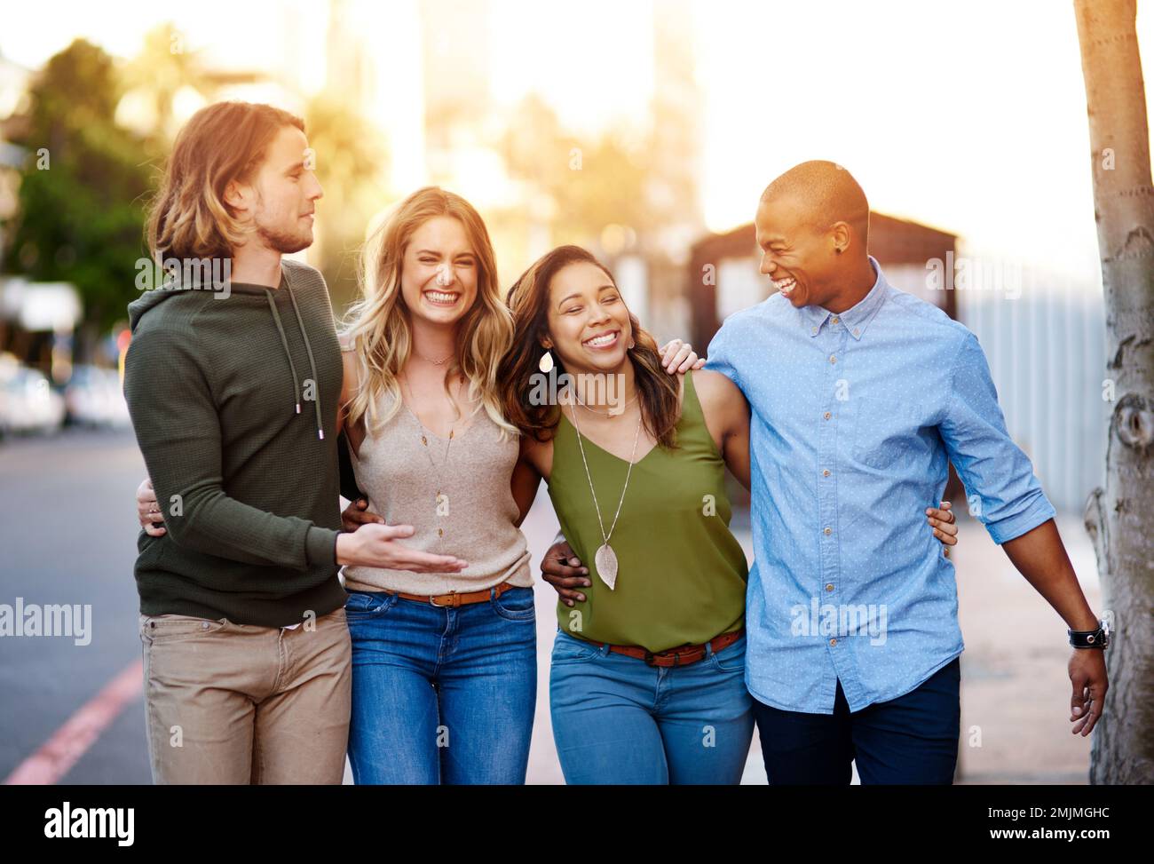 Happy ethnic couple talking strolling hi-res stock photography and ...