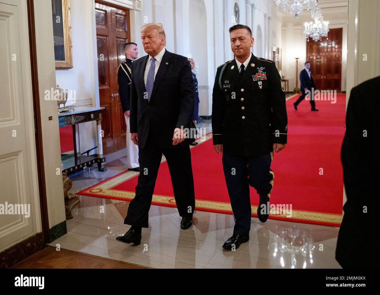 President Donald Trump and Army Staff Sgt. David Bellavia arrive for a ...