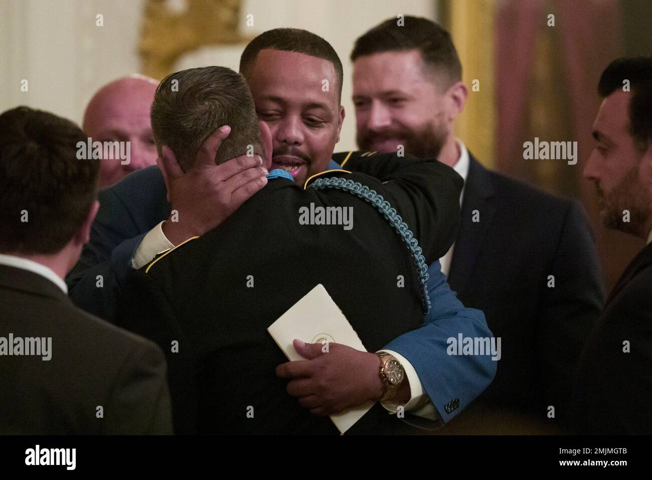 Medal of Honor recipient Army Staff Sgt. David Bellavia, second from ...