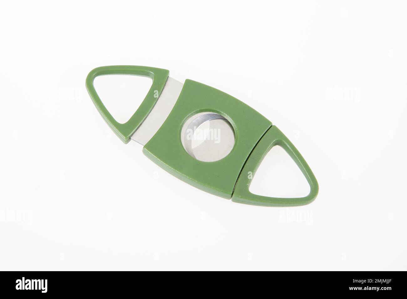 green cigar cutter on white background Stock Photo - Alamy