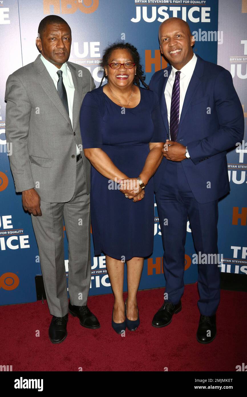 Howard Stevenson, left, Christy Taylor and Bryan Stevenson, founder and executive director of ...