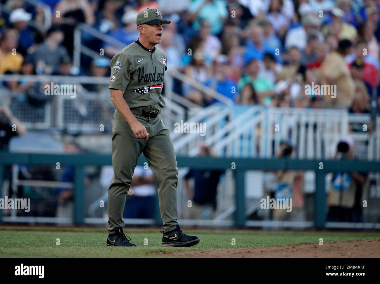 Vanderbilt head coach Tim Corbin walks to the mound during sixth the ...