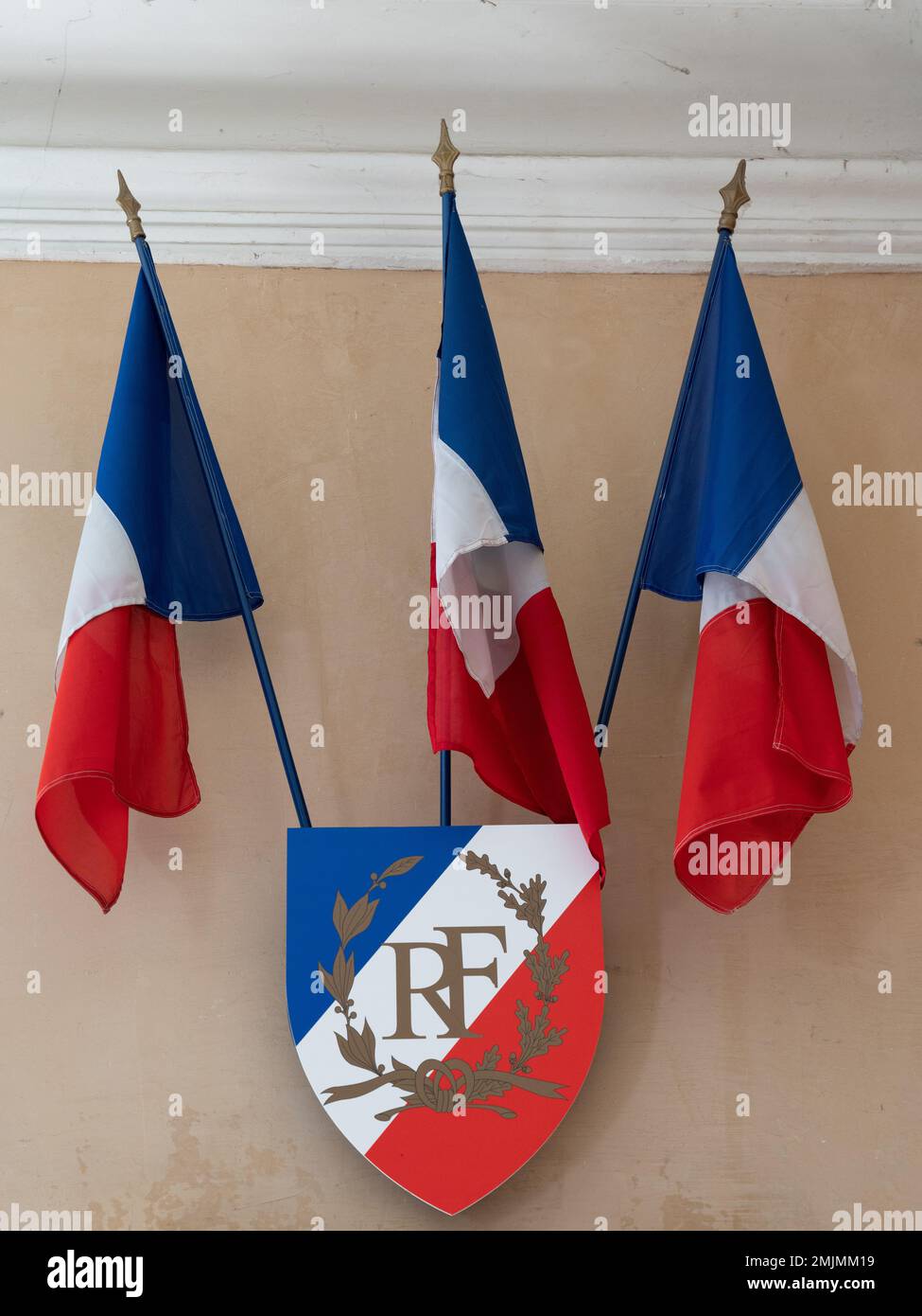 French flags and badge RF means French Republic in exterior of the city ...