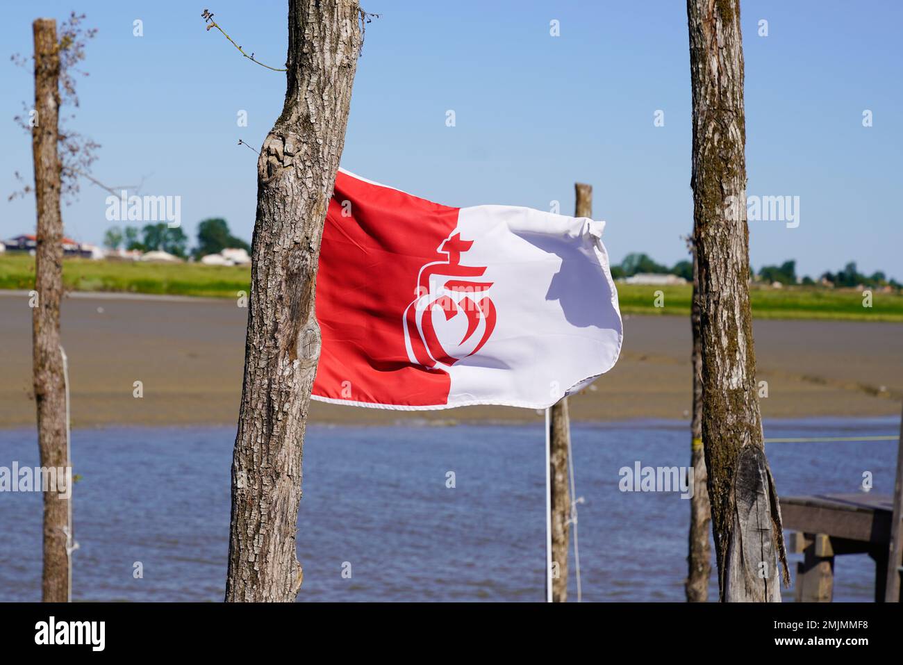 french vendee Country flag red and white on the Atlantic Ocean coast in ...