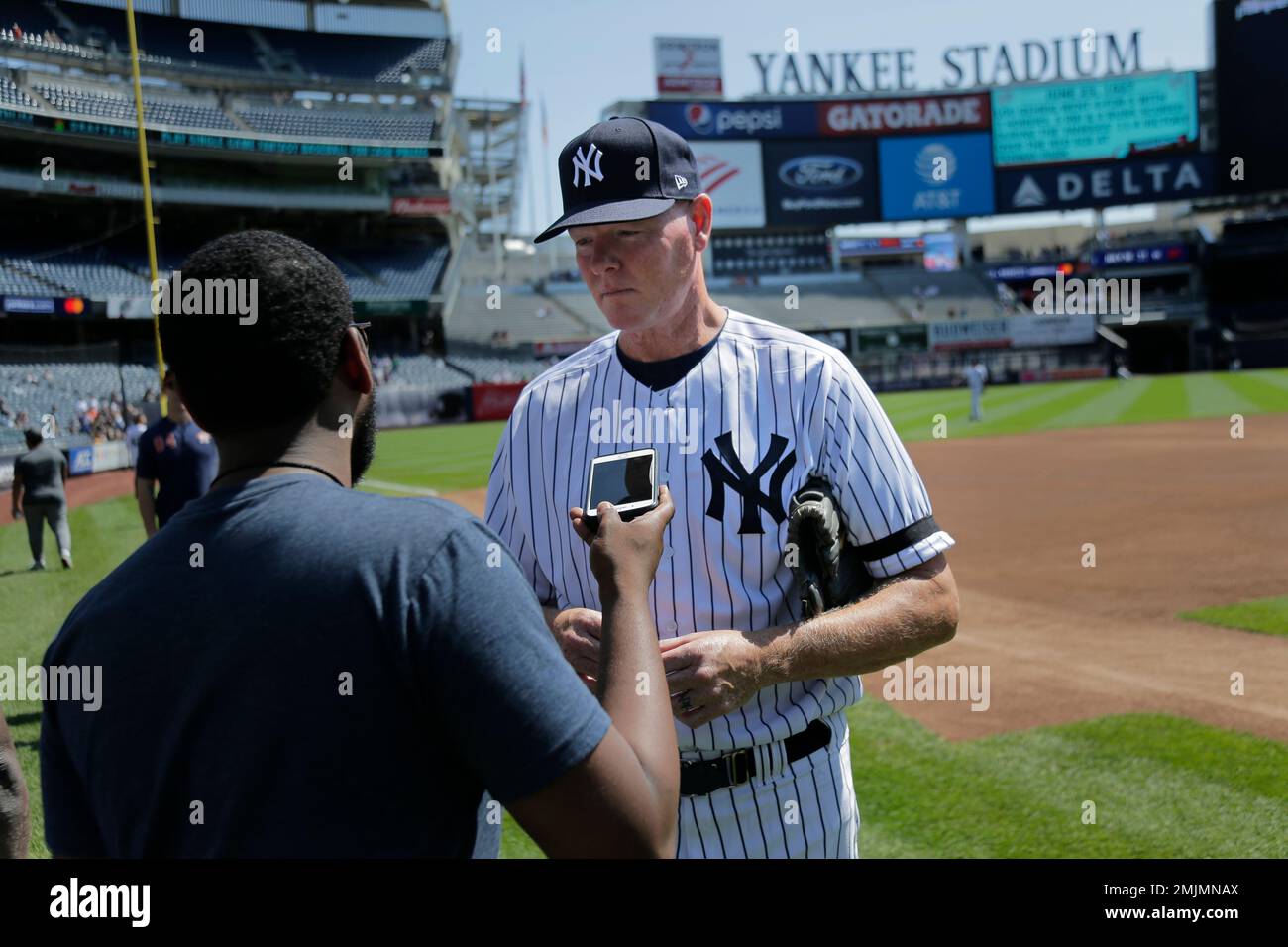 Former New York Yankee Jeff Nelson talk to reporters during Old Timer's ...