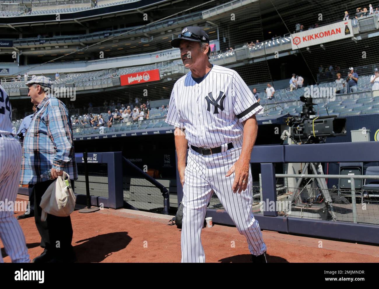 Former New York Yankee Ron Guidry walks on the field during Old Timer's ...