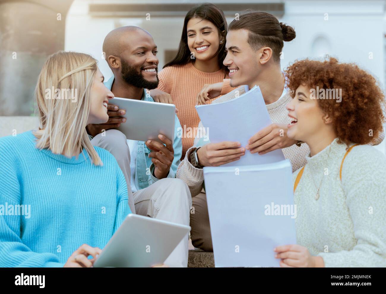 Tablet, university and students group studying, teamwork and planning ...