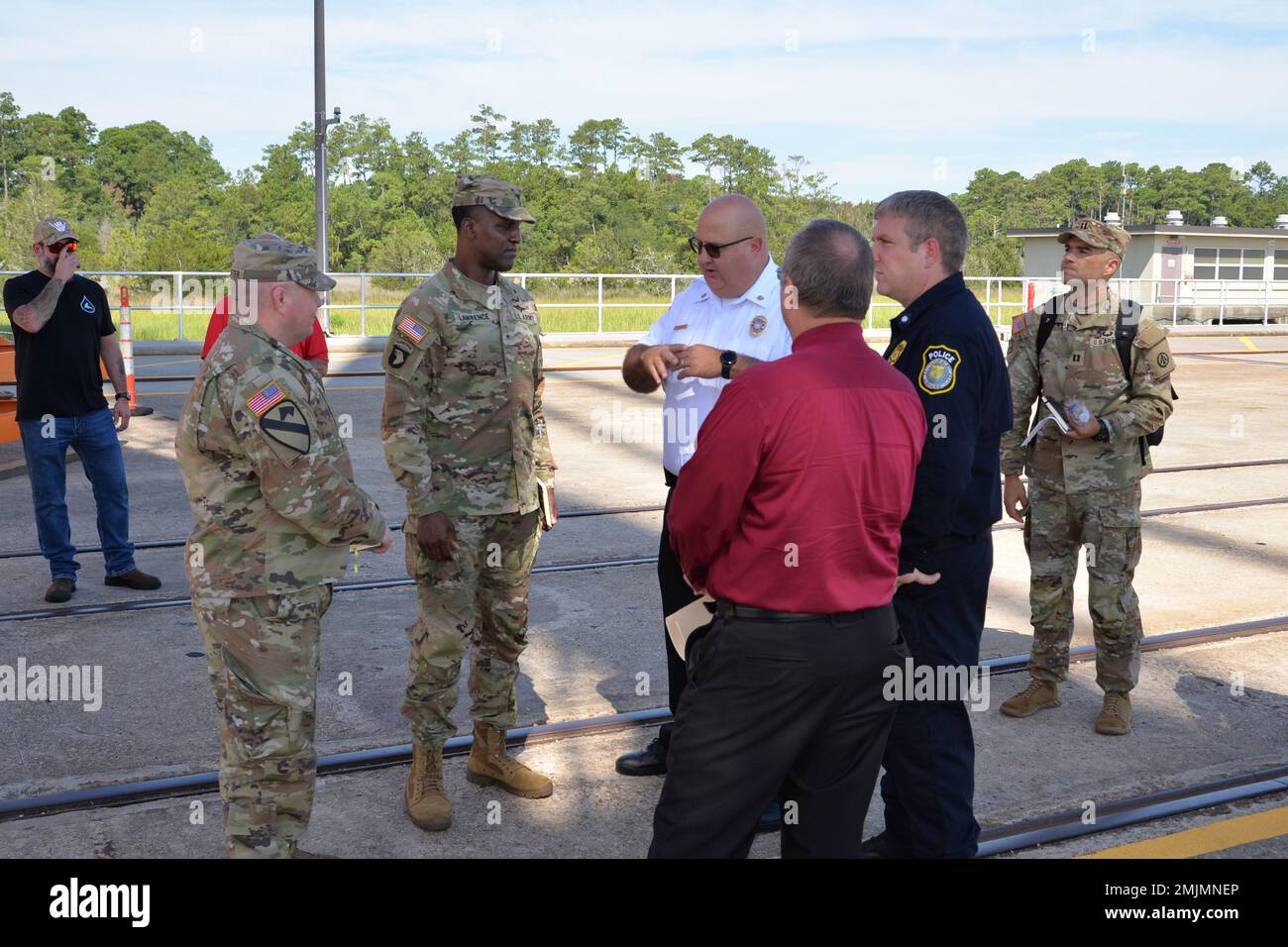 Fire Chief Mike Scott briefs Brig. Gen. Gavin A. Lawrence, Military ...