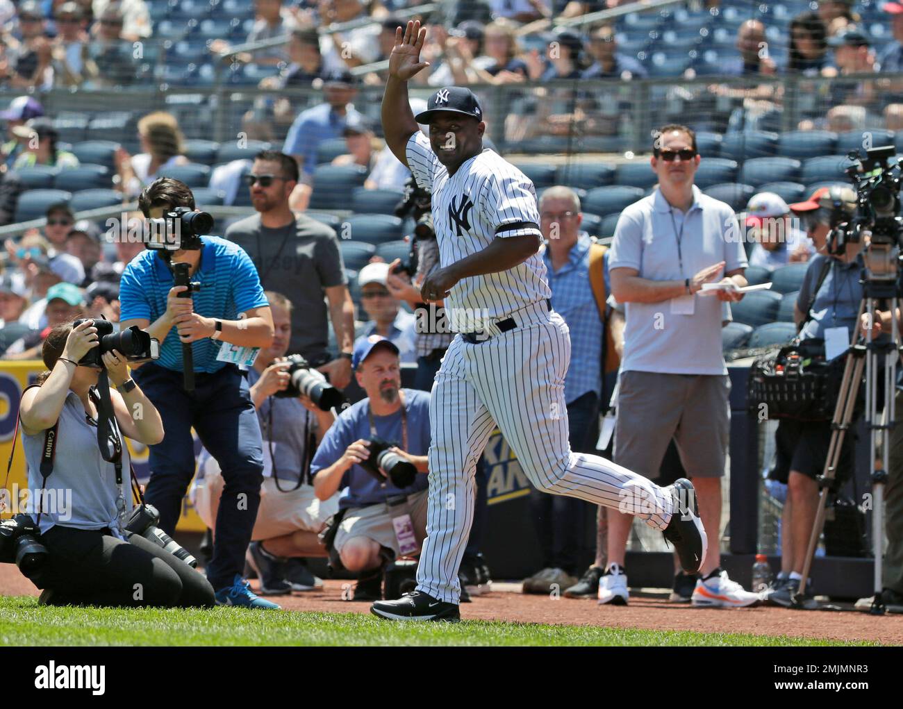 Former New York Yankee Homer Bush is introduced during Old Timer's Day ...