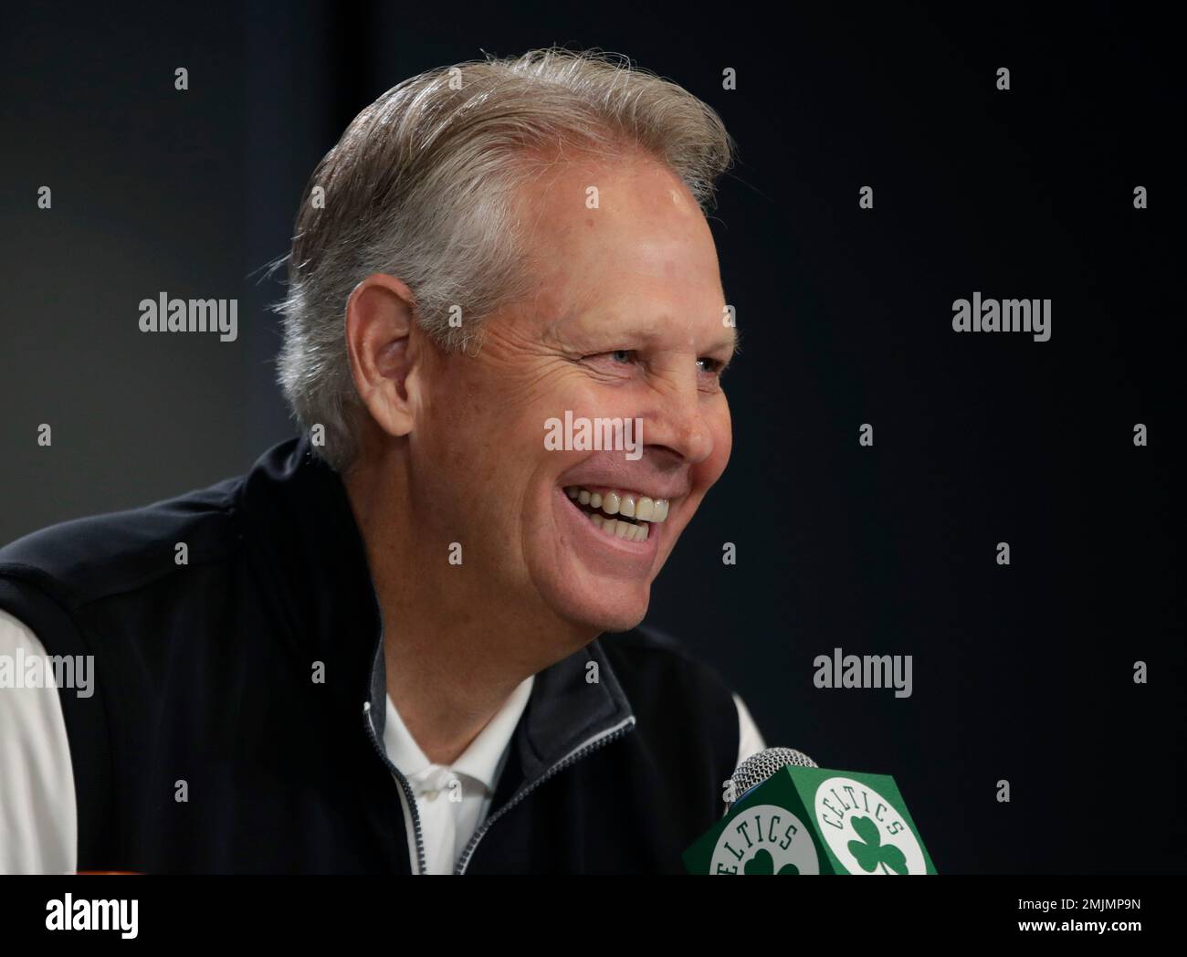 Boston Celtics basketball general manager Danny Ainge laughs during a ...