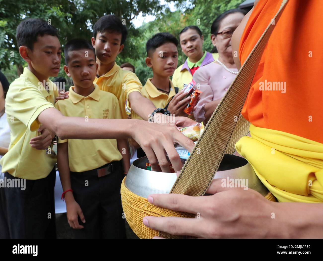 Members of the Wild Boars soccer team who were rescued from a flooded ...