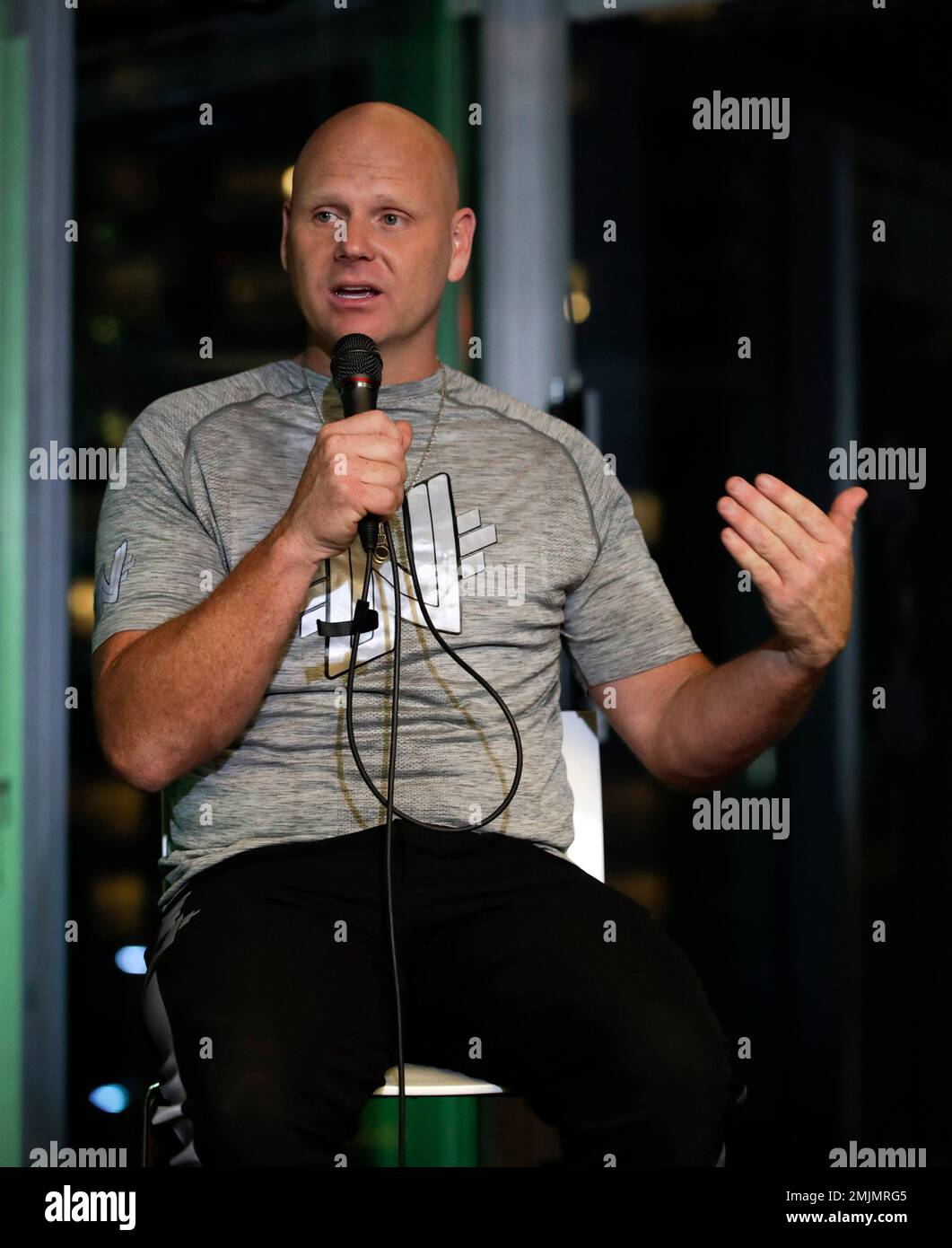 Aerialist Nik Wallenda talks during a news conference after he and his ...