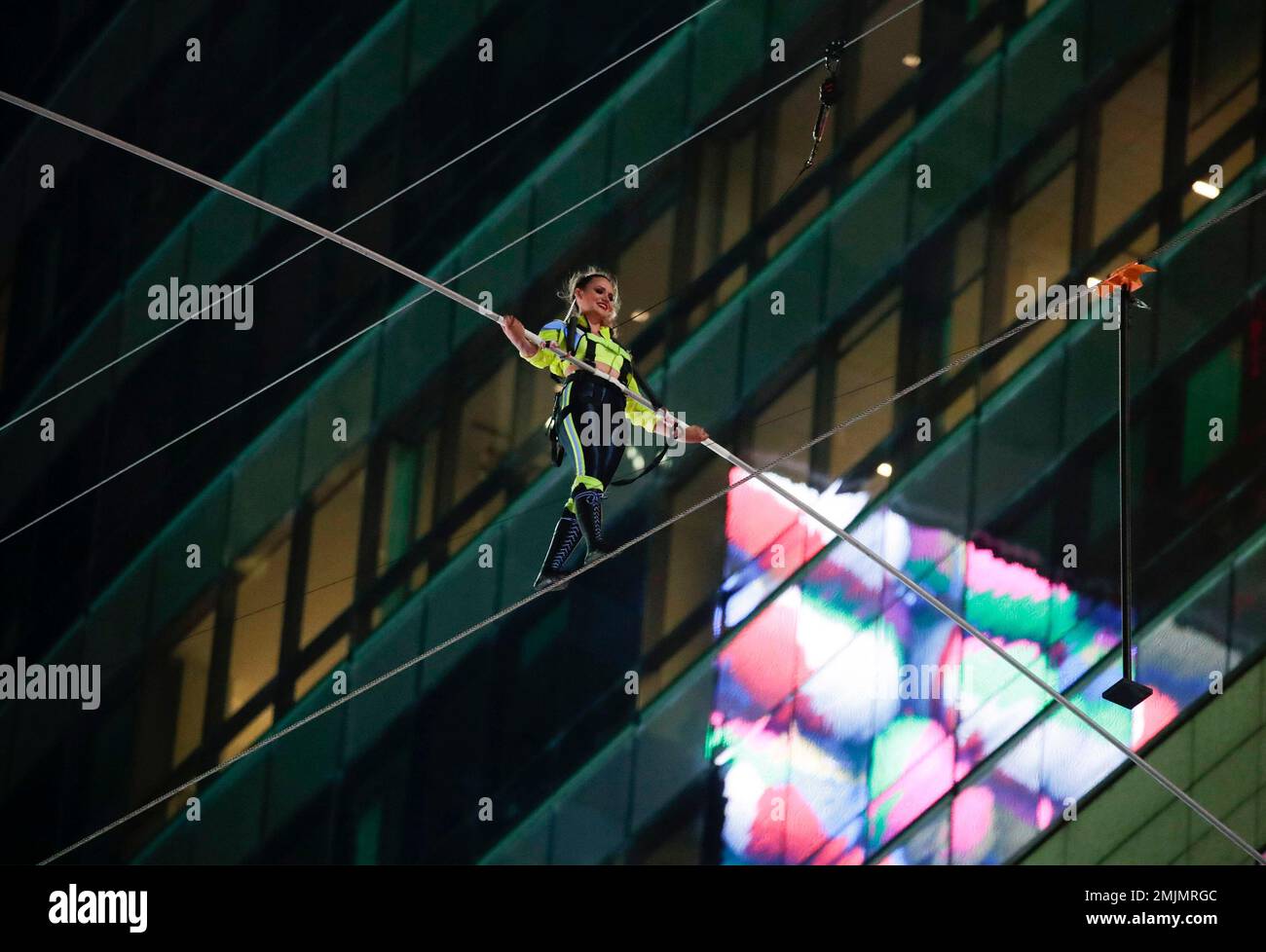 Aerialist Lijana Wallenda walks on a high wire above Times Square ...