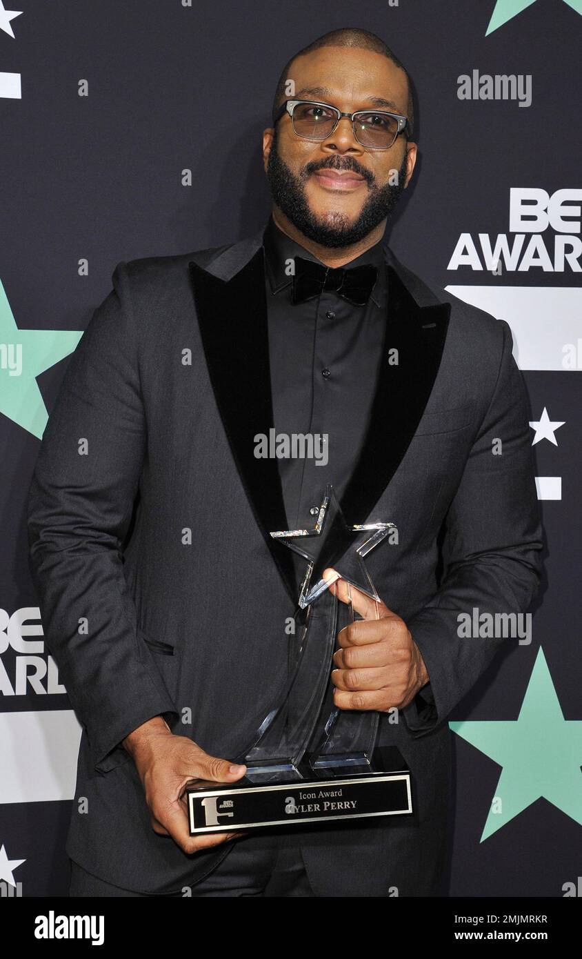 Tyler Perry poses in the press room with the ultimate icon award at the ...