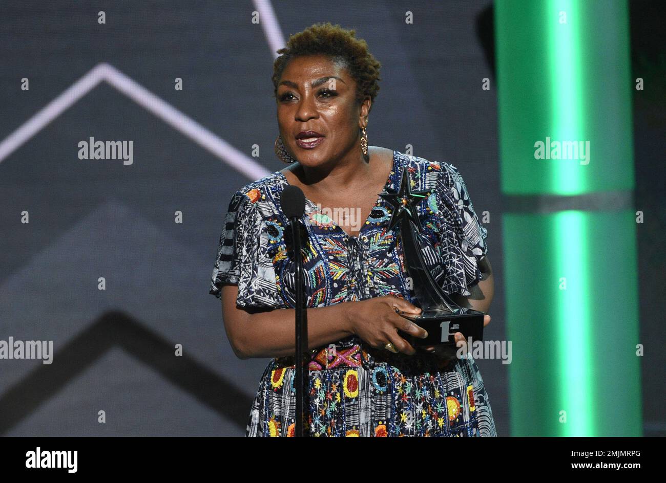 Bose Ogulu accepts the award for best international act on behalf of ...