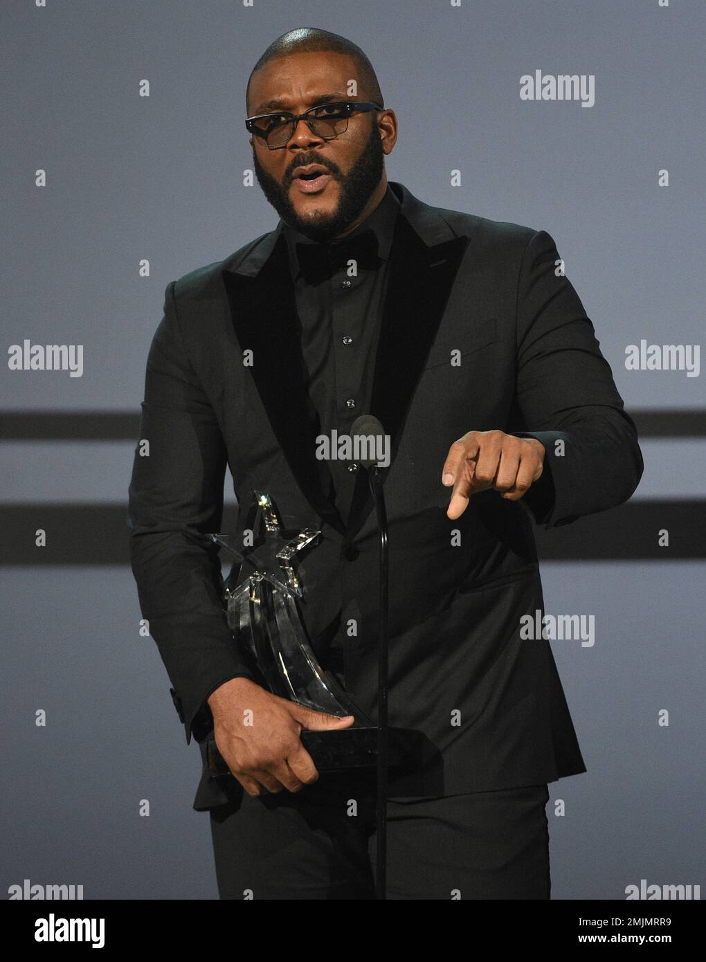 Tyler Perry accepts the ultimate icon award at the BET Awards on Sunday ...