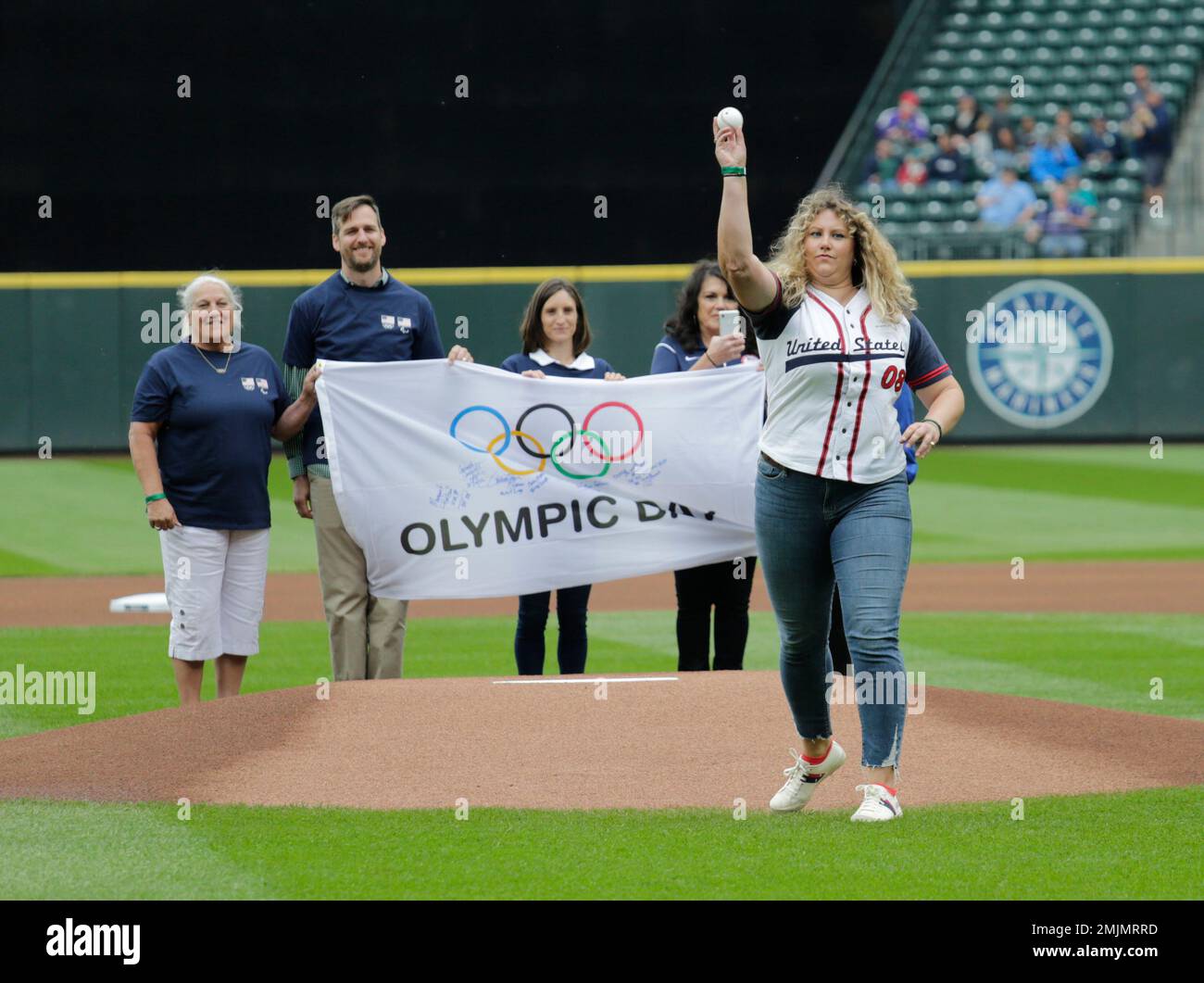 Former U.S. Olympic swimmer Margaret Hoelzer throws out the first pitch ...