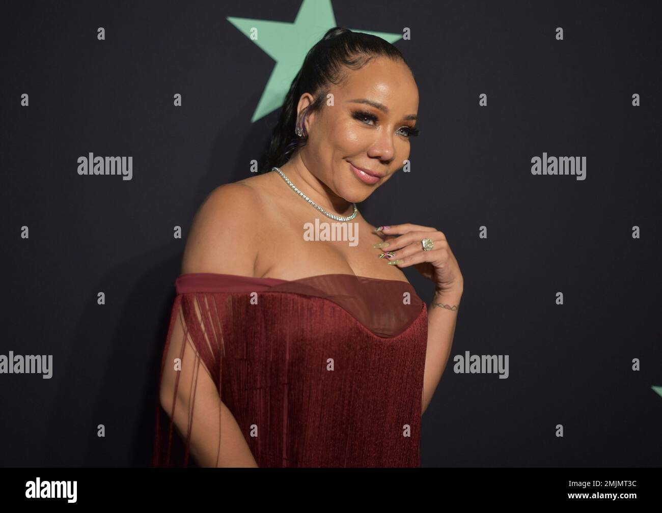 Tameka Cottle poses in the press room at the BET Awards on Sunday, June ...