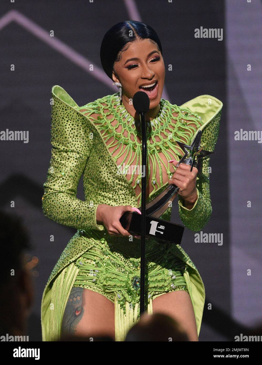 Cardi B accepts the album of the year award for "Invasion of Privacy ...