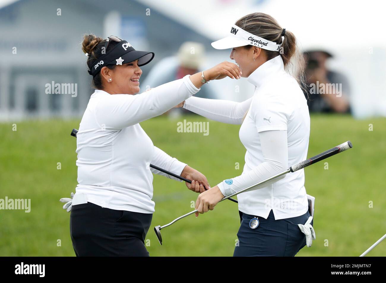 Hannah Green, right, of Australia, gets a hug from Lizette Salas, left ...