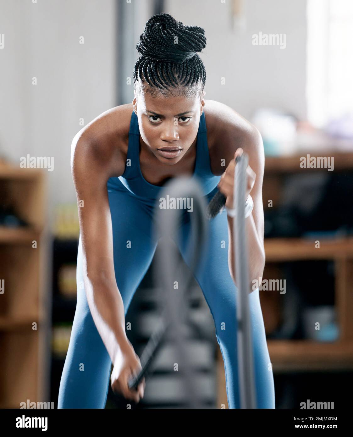 Fitness, battle ropes or strong black woman training for body goals in ...