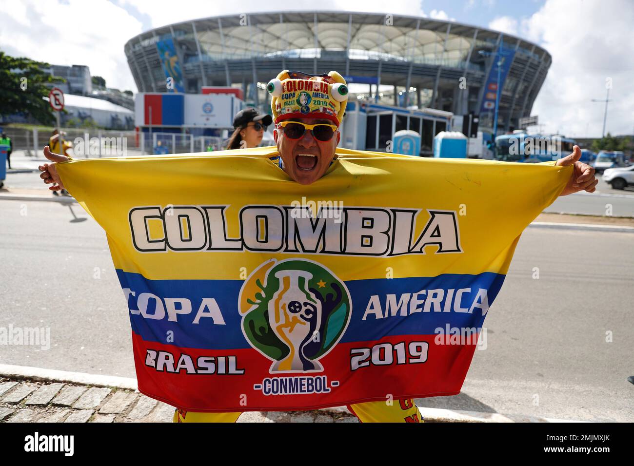 A fan of Colombia poses for photos prior to a Copa America Group B ...