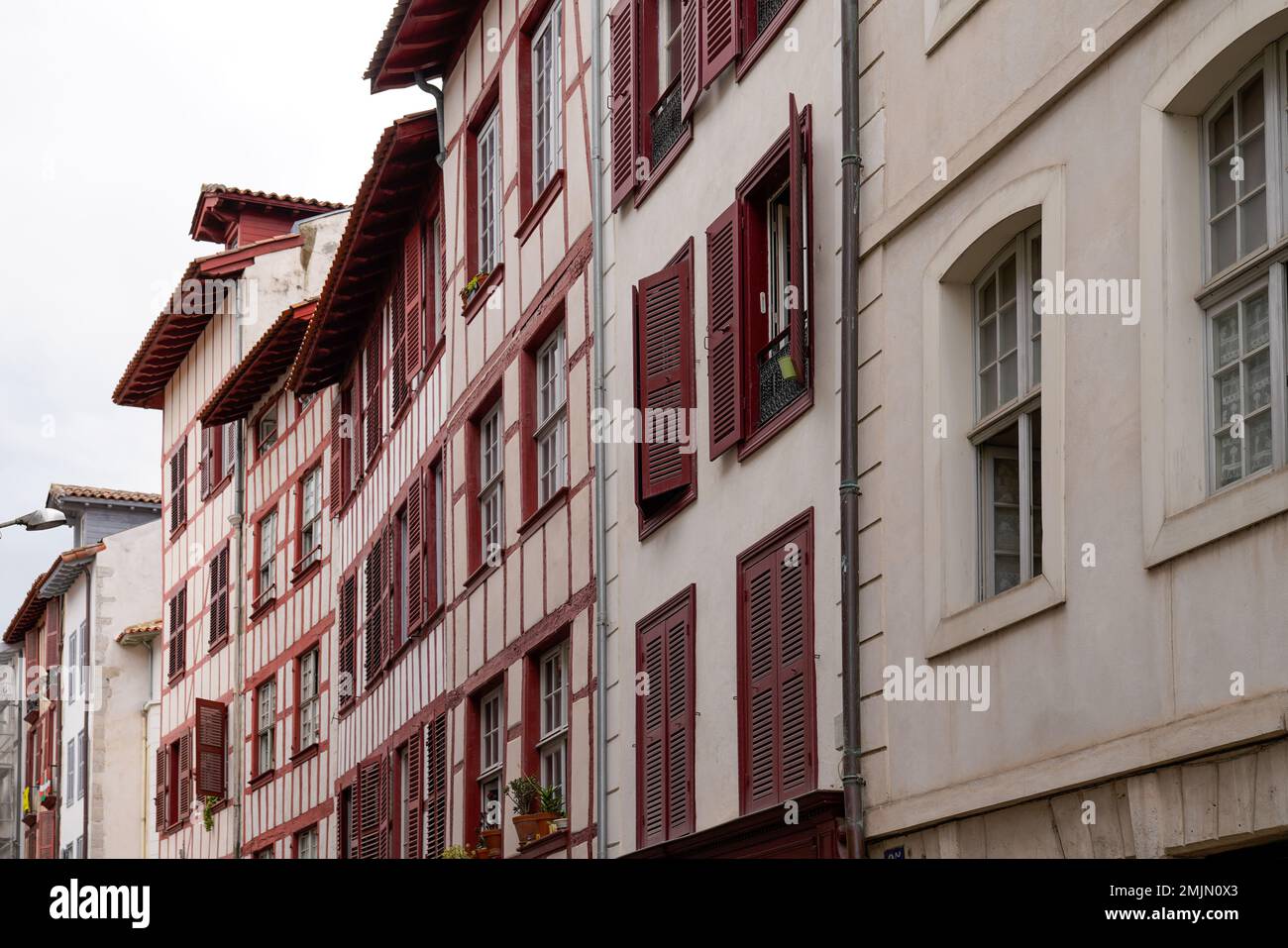 classical bask house in french city street in basque country in france ...