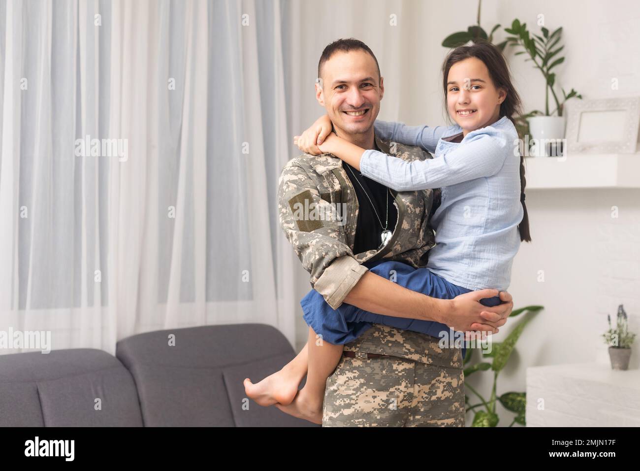 Parents armed with child hi-res stock photography and images - Alamy