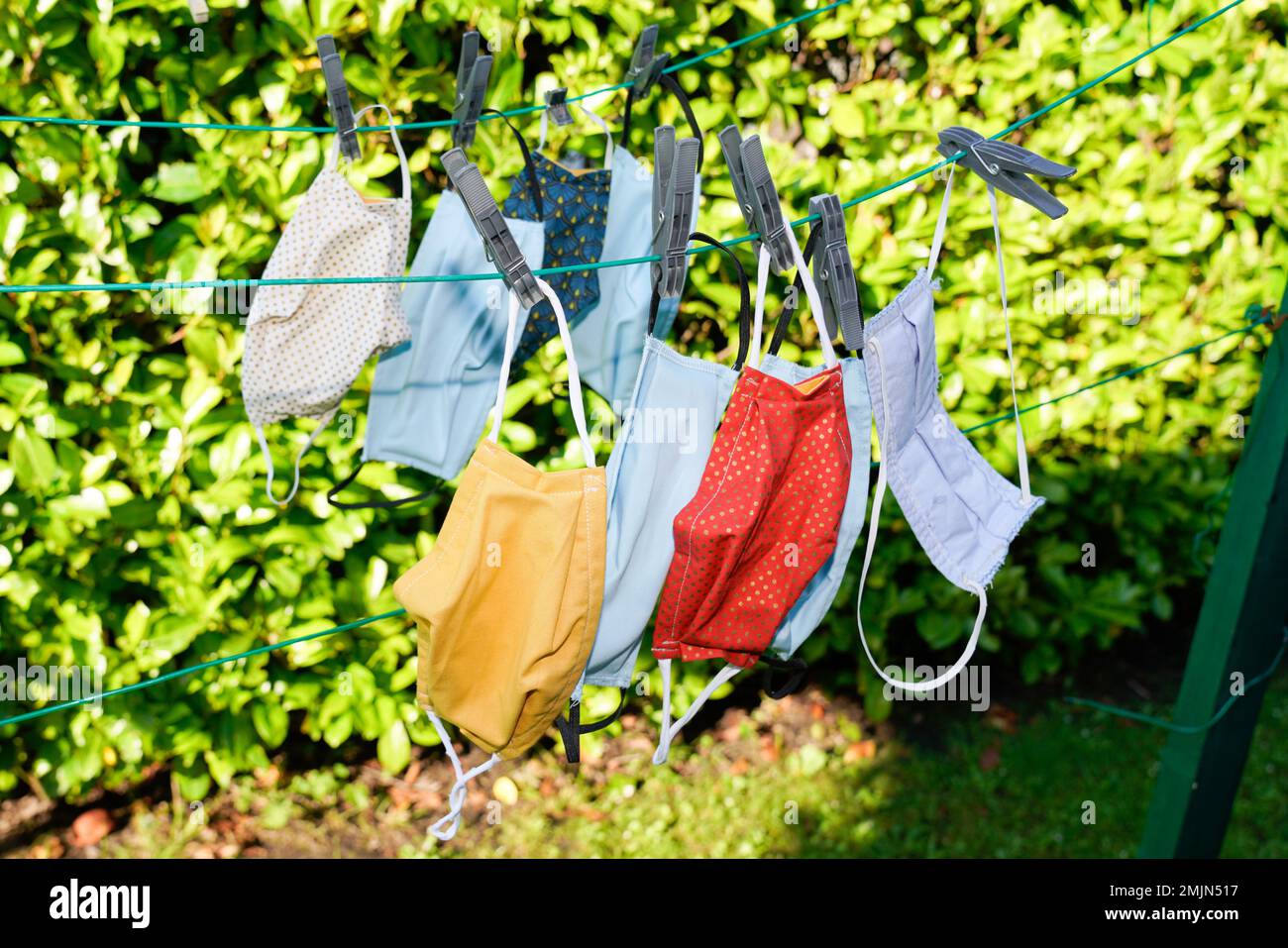 textile mask on washing line for spread protection anti bacteria Corona ...