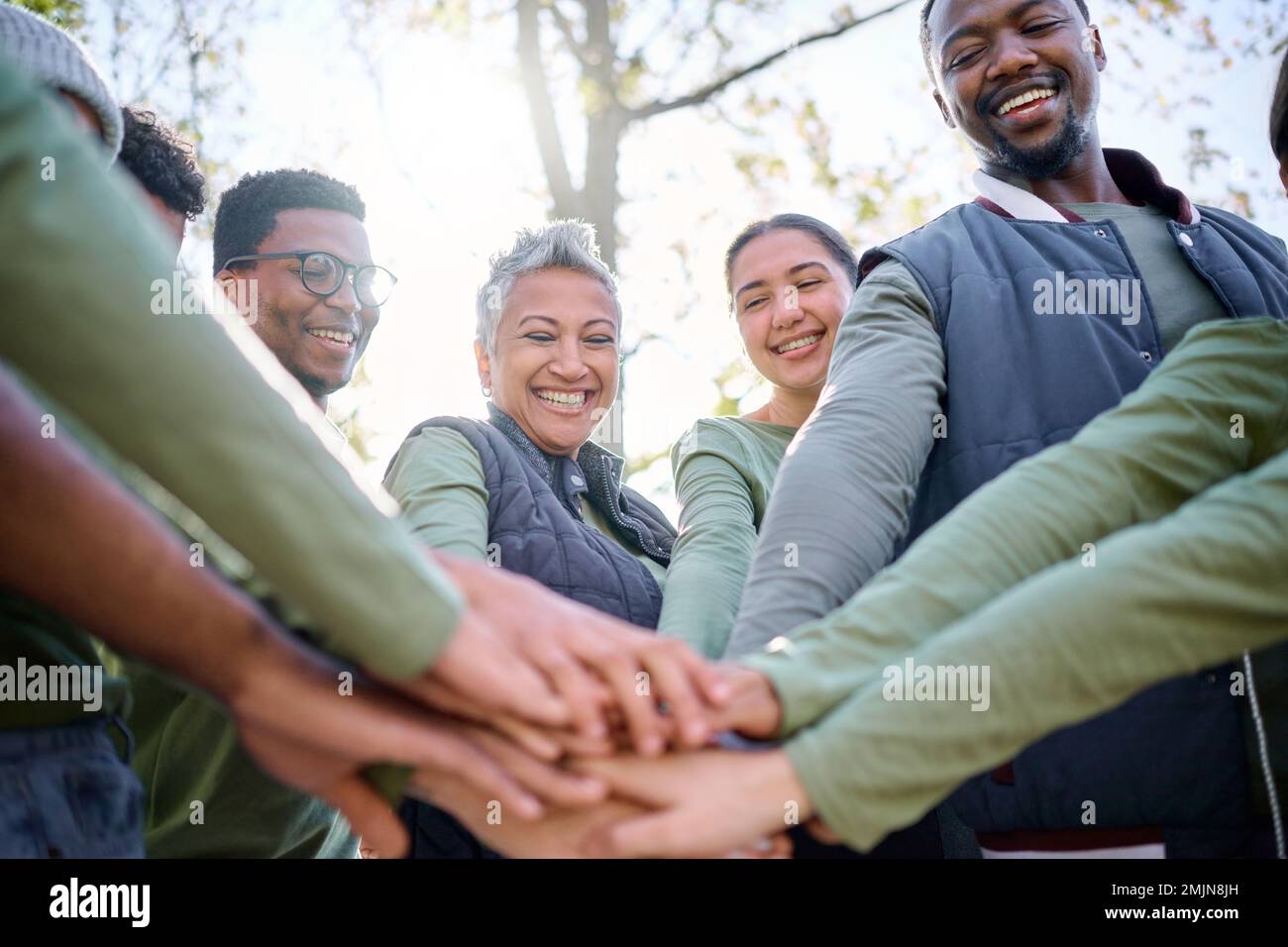 Teamwork, motivation and huddle with senior friends hiking together in ...
