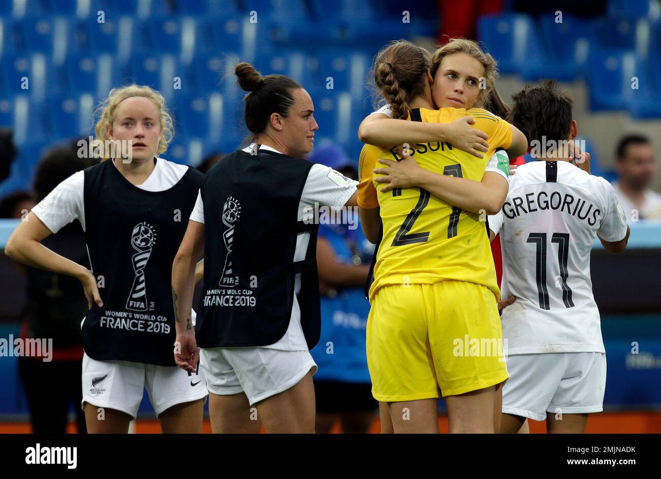 New Zealand's Daisy Cleverley, 2nd right, hugs goalkeeper Victoria ...