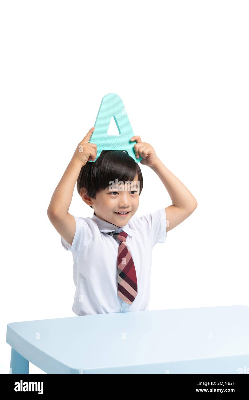 The little boy in learning Stock Photo - Alamy