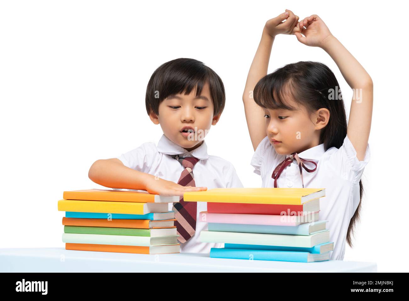 The little boy and little girl in the study Stock Photo - Alamy