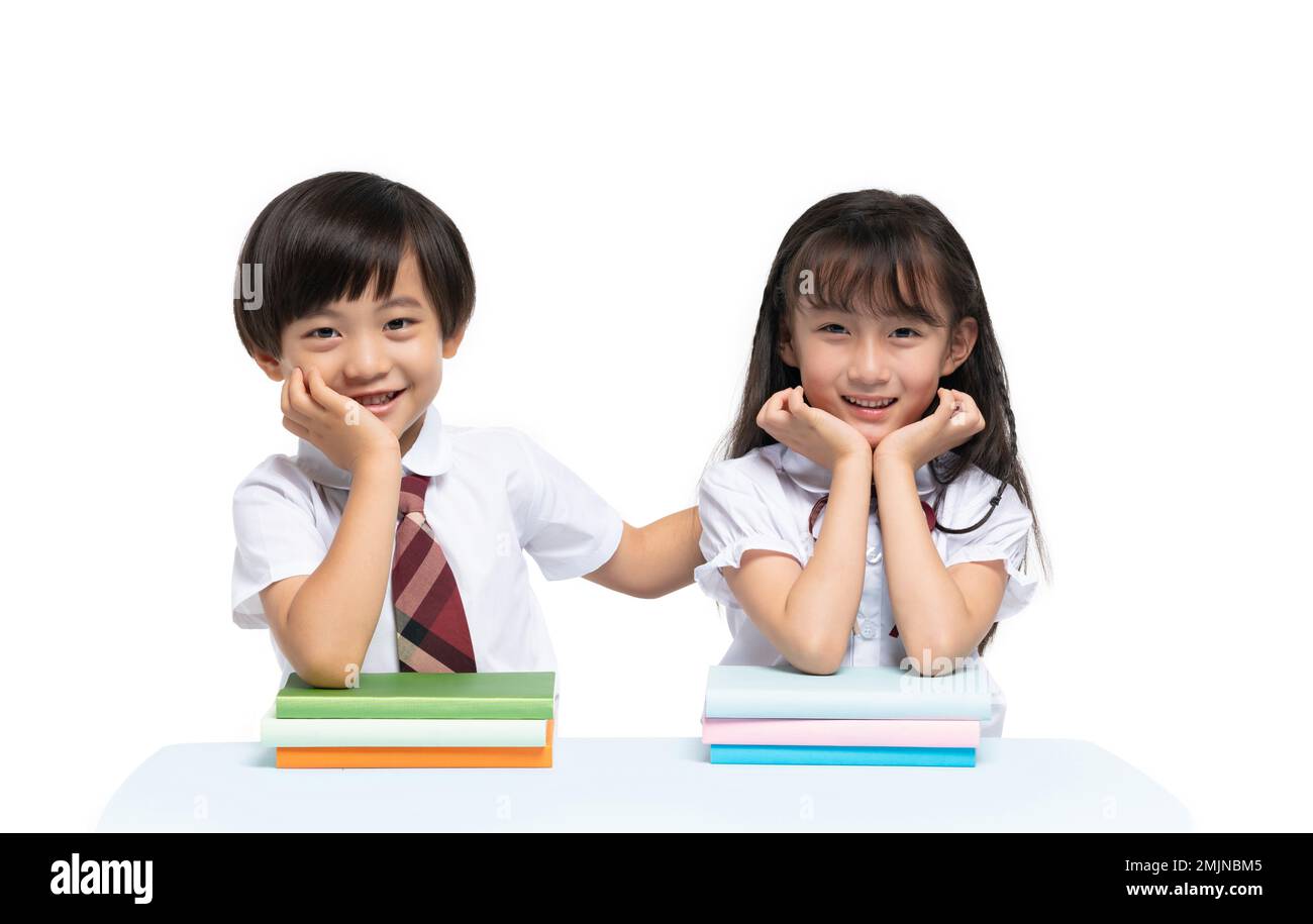 The little boy and little girl in the study Stock Photo - Alamy