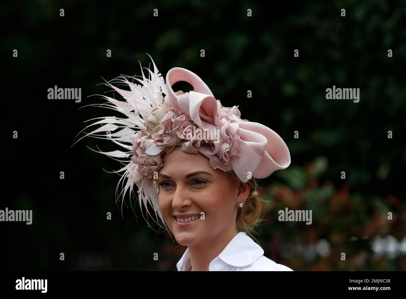 Alexandra Bertram poses for photographers as she attends on the third ...