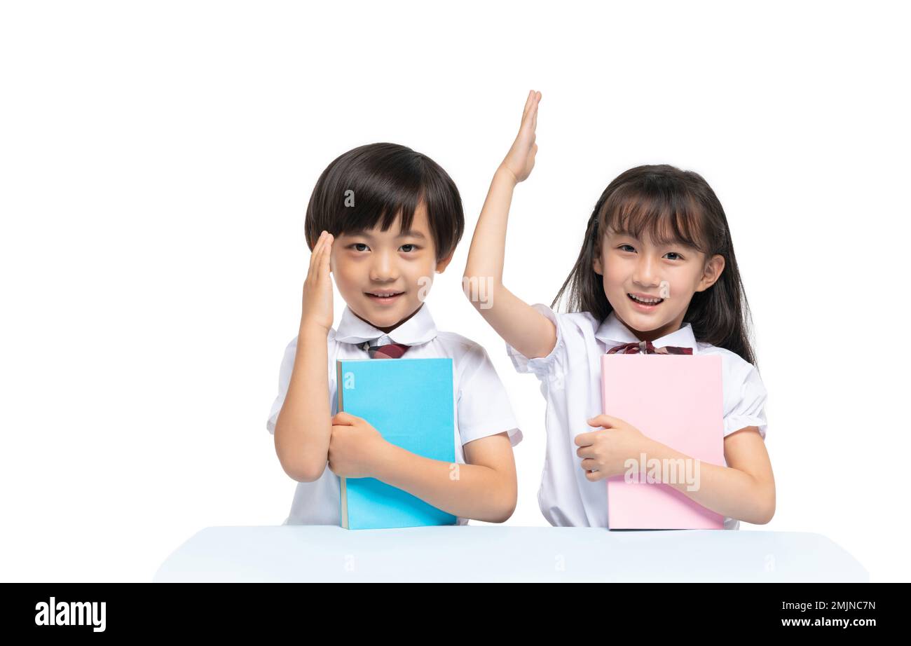 The little boy and little girl in the study Stock Photo - Alamy