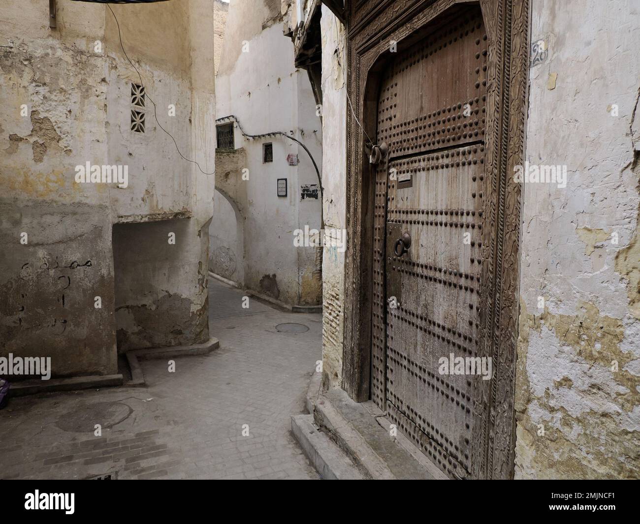A Small street in Fez Fes medieval medina (old town). Morocco Stock ...